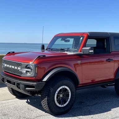 I designed and fabricated traction board mounts -- for Bronco roll bar ...