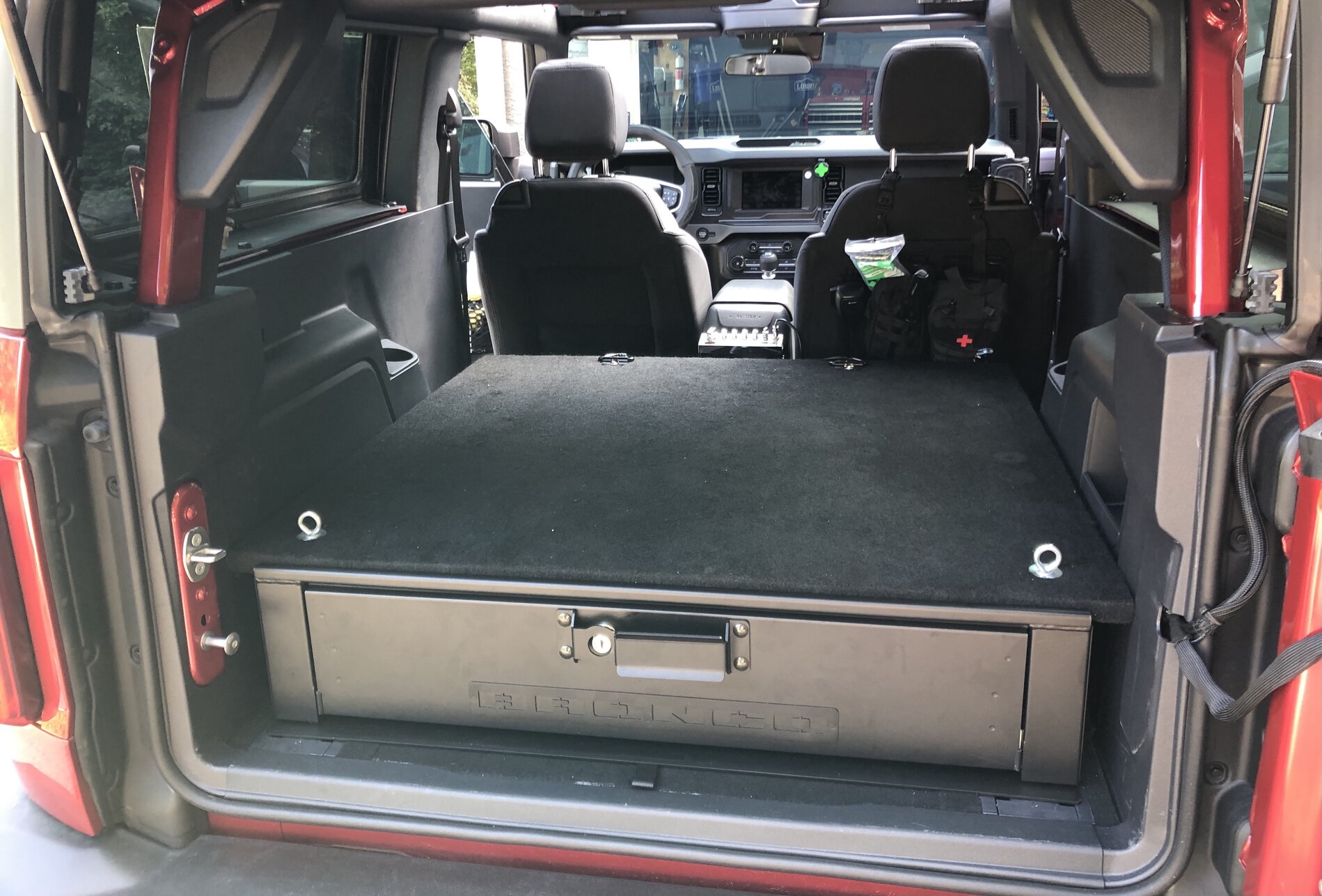 Ford cargo security drawer installed in a 2-door Bronco with rear seat ...