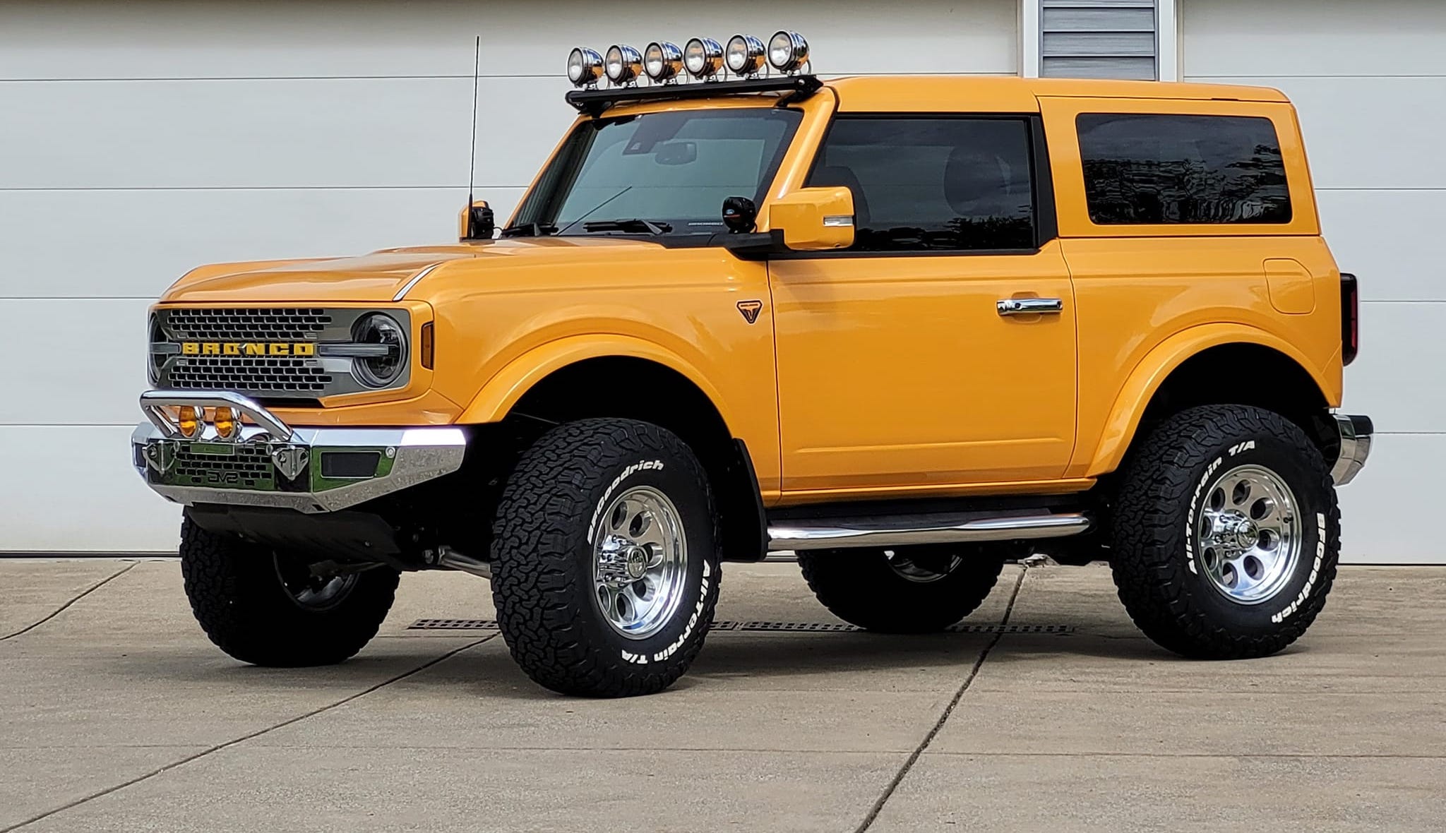 Retro Cyber Orange Bronco with chrome bumpers 2-door build | Bronco6G ...